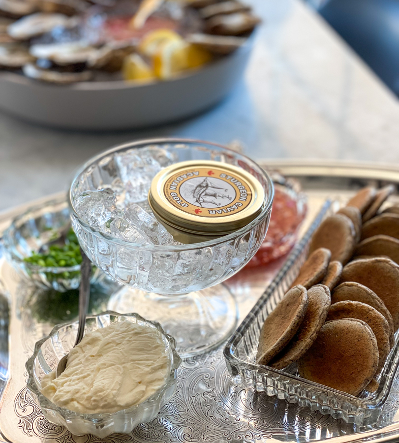 Sturgeon Caviar with Buckwheat Blinis | Grand Prix Eats